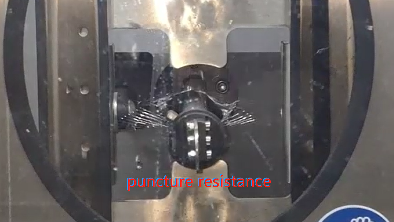 How is the puncture resistance of the stretch film tested?